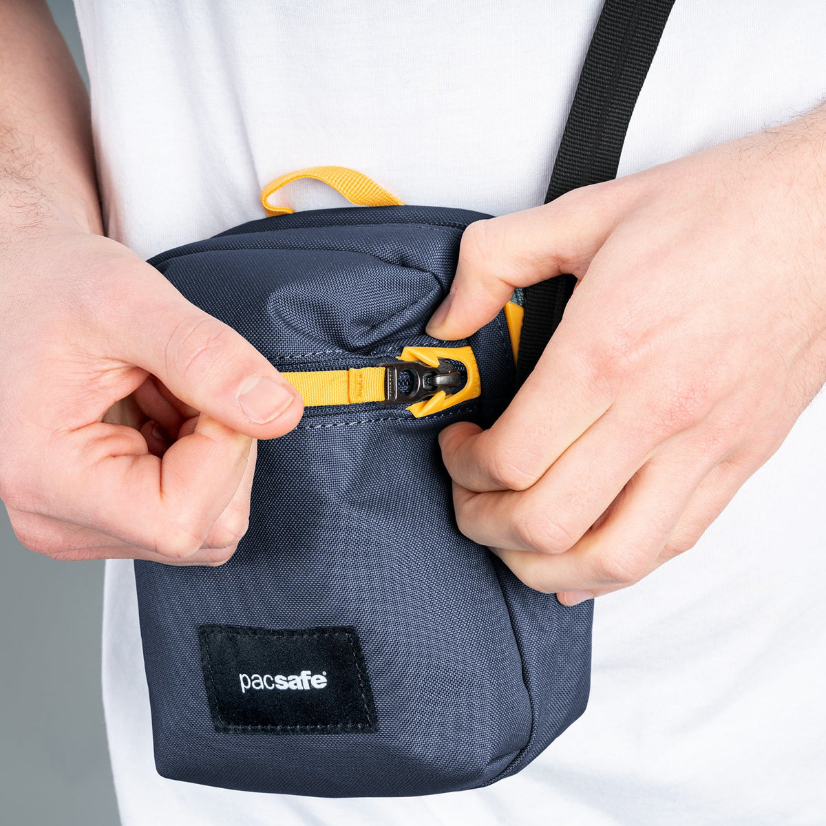 Pacsafe® GO anti-theft micro crossbody | Pacsafe® - Pacsafe - Official ...